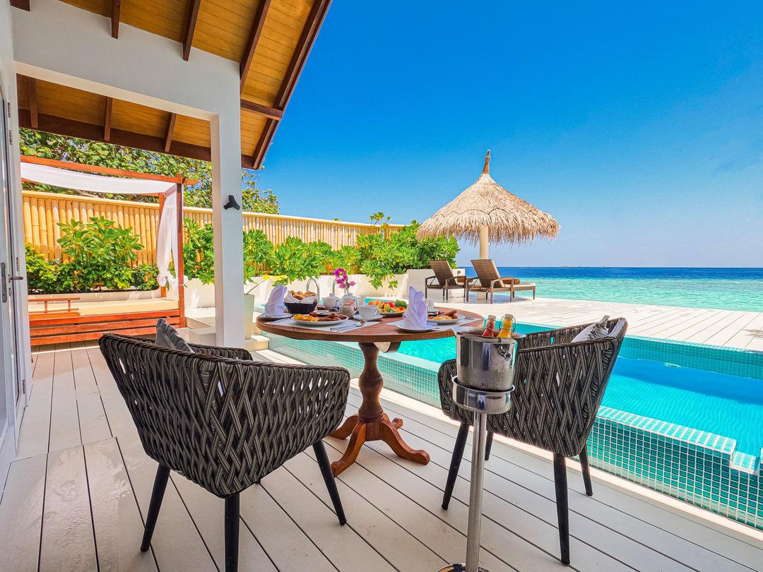 "Malahini Kuda Bandos Resort Maldives | Boutique Island Retreat
